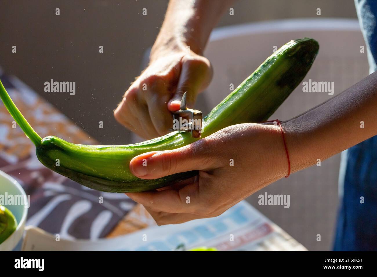Finger fresh cucumber slice hi-res stock photography and images - Alamy