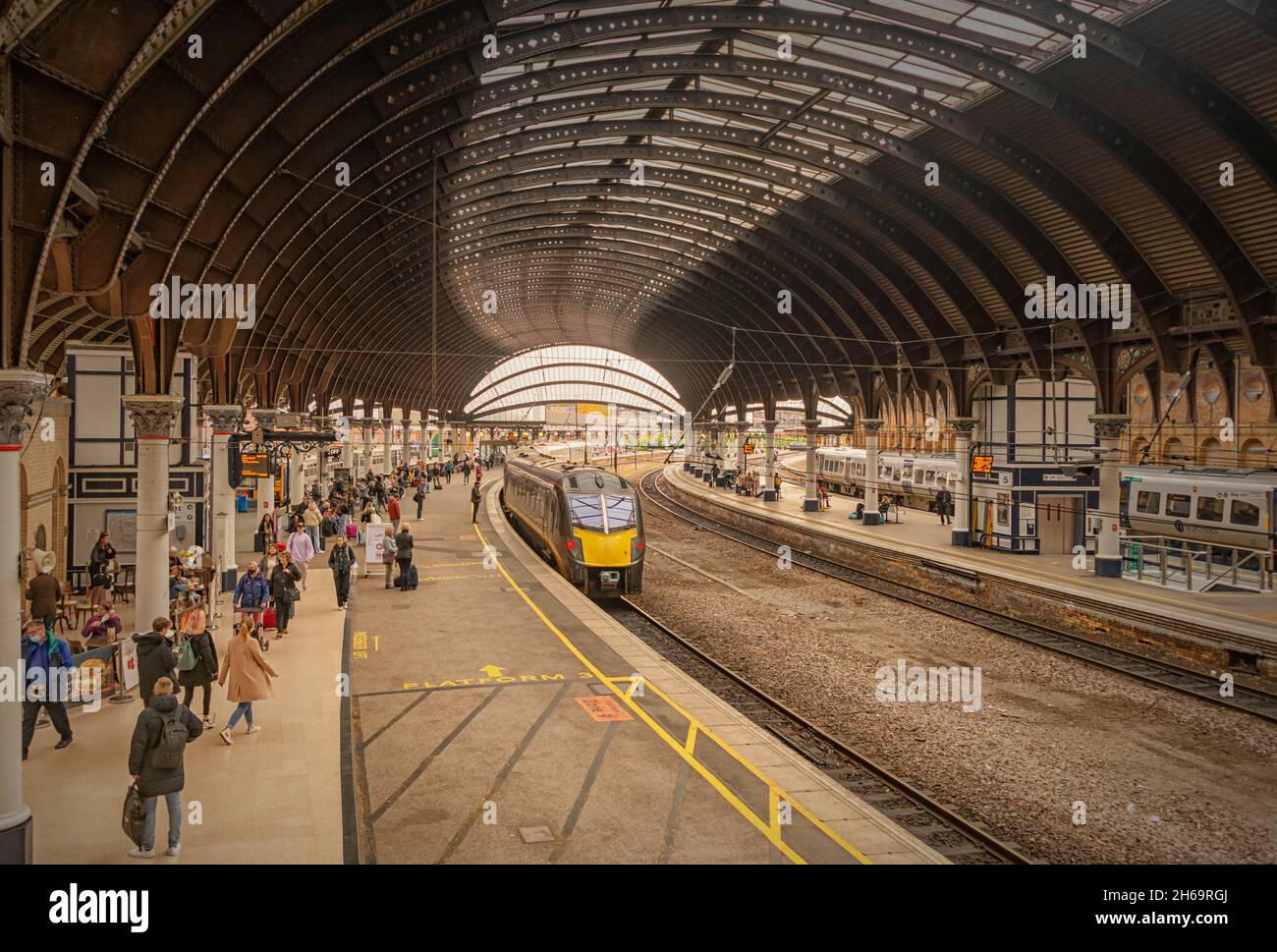 Typical view of a railway station platform with two trains waiting to ...