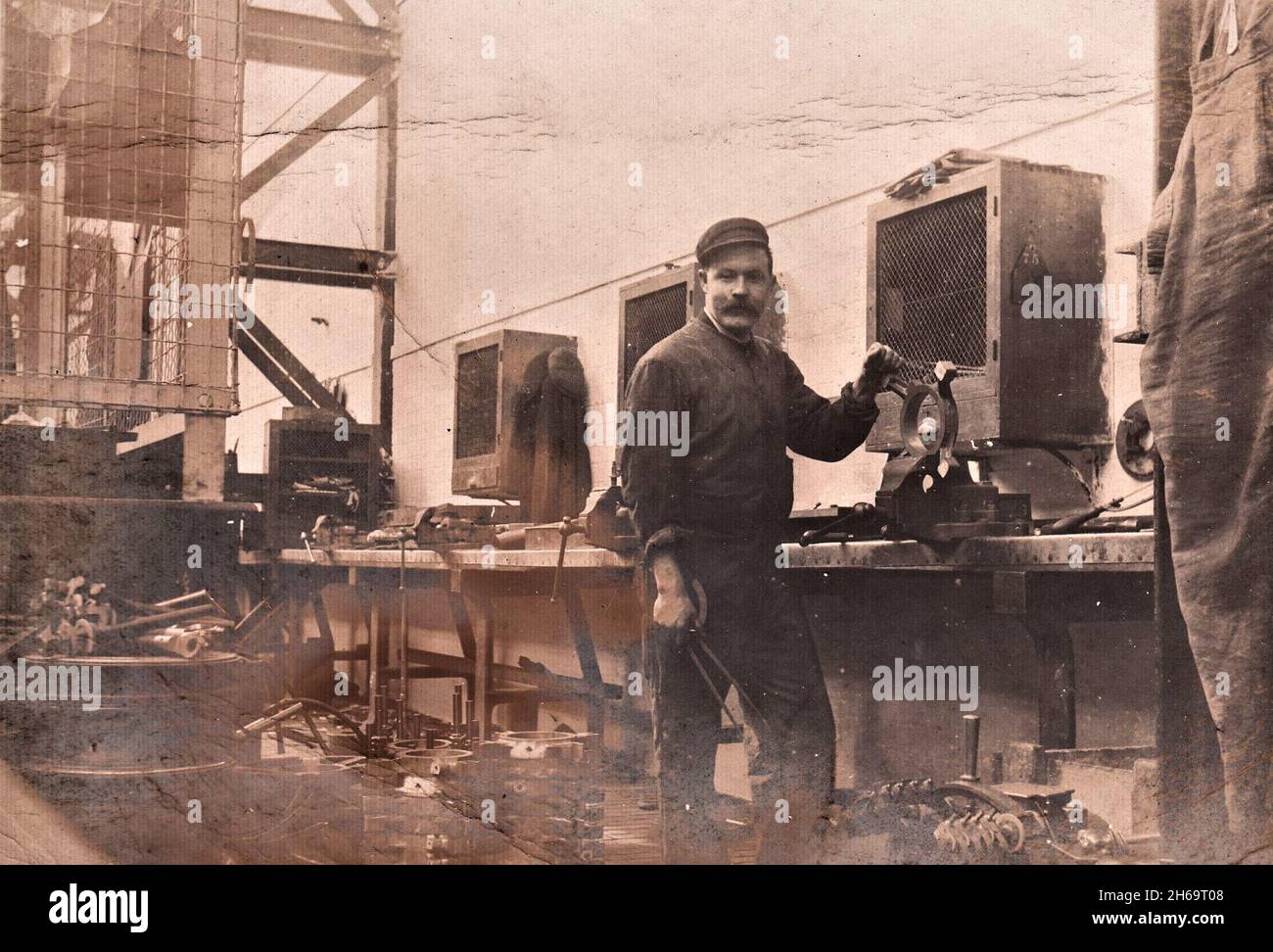 Birmingham metal worker shown in his workshop, with the tools of his ...