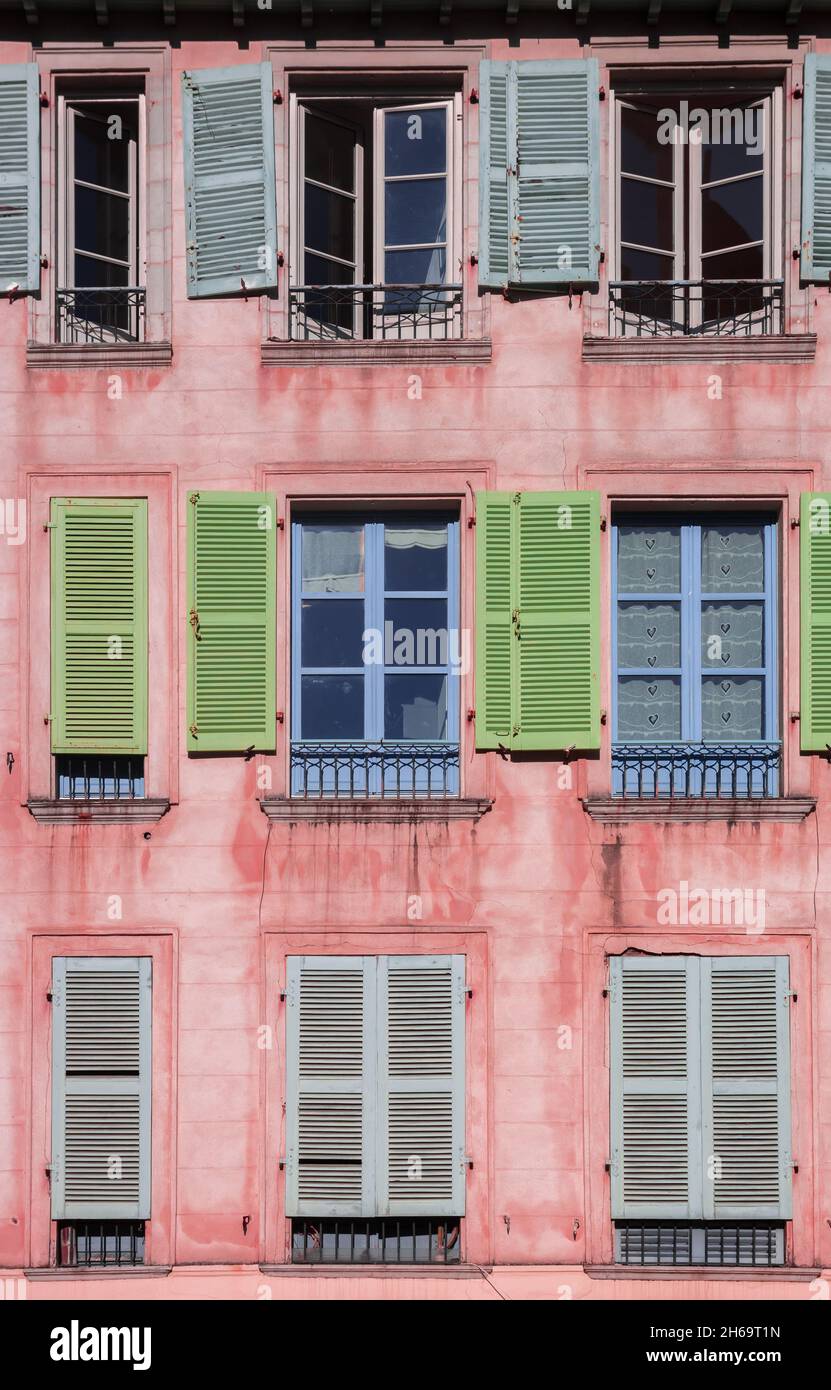 Windows with shutters on the facade of a historic house in Bayonne ...