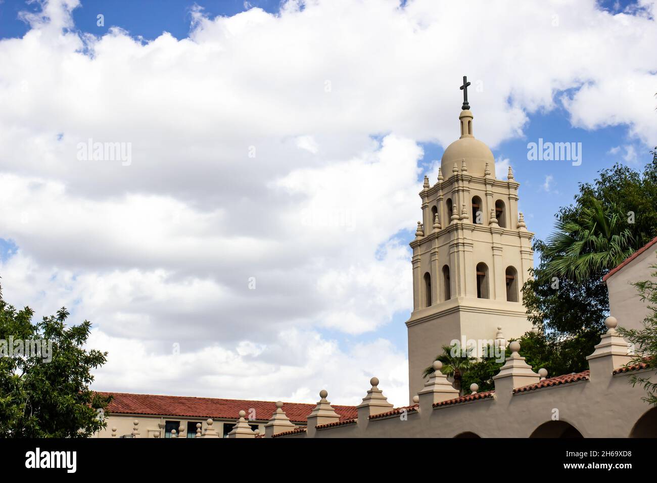 Spanish Style Church Belfry With Cross Stock Photo - Alamy