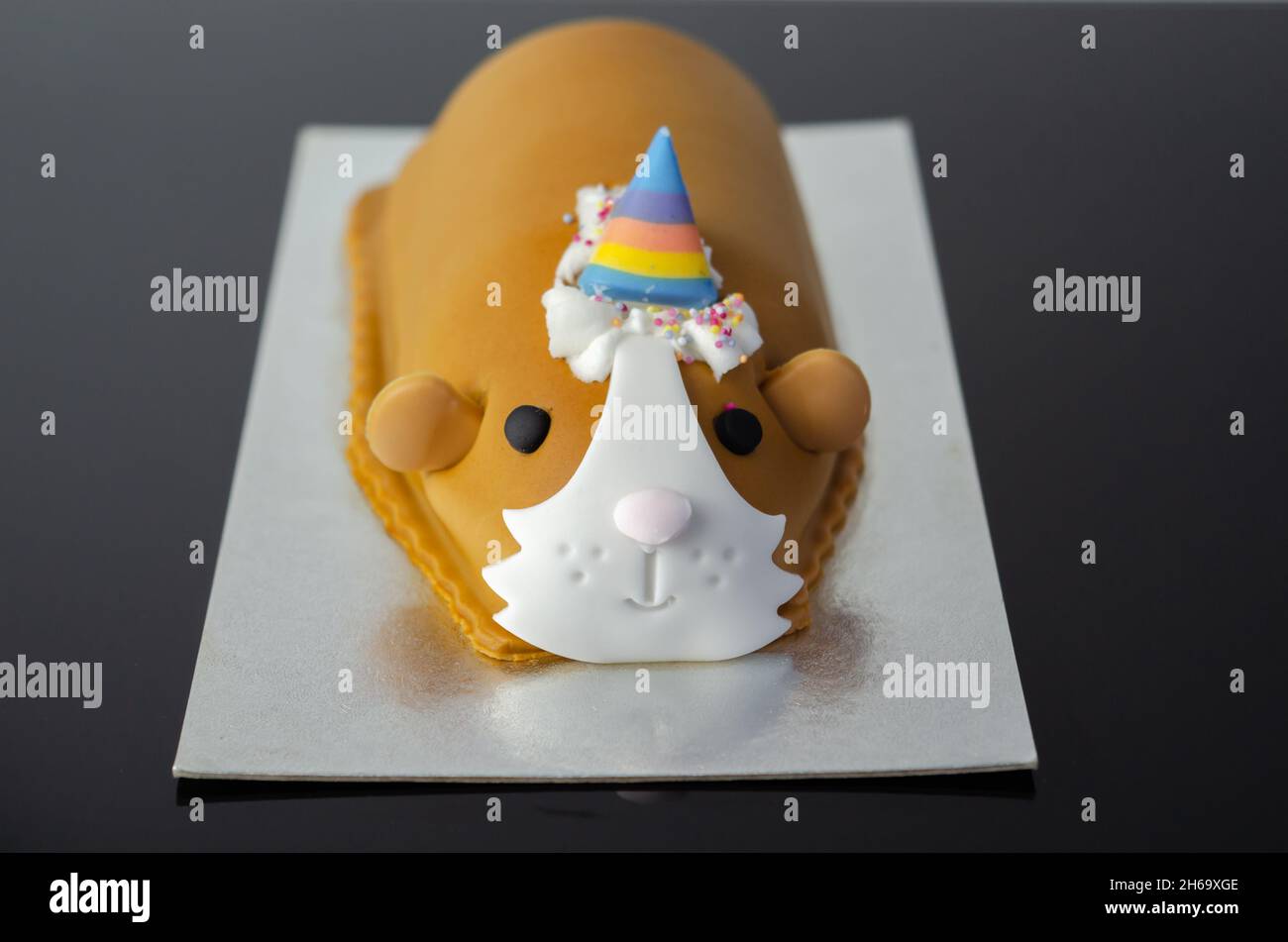 Guinea pig cake, soft madeira sponge layered with fruity raspberry jam ...