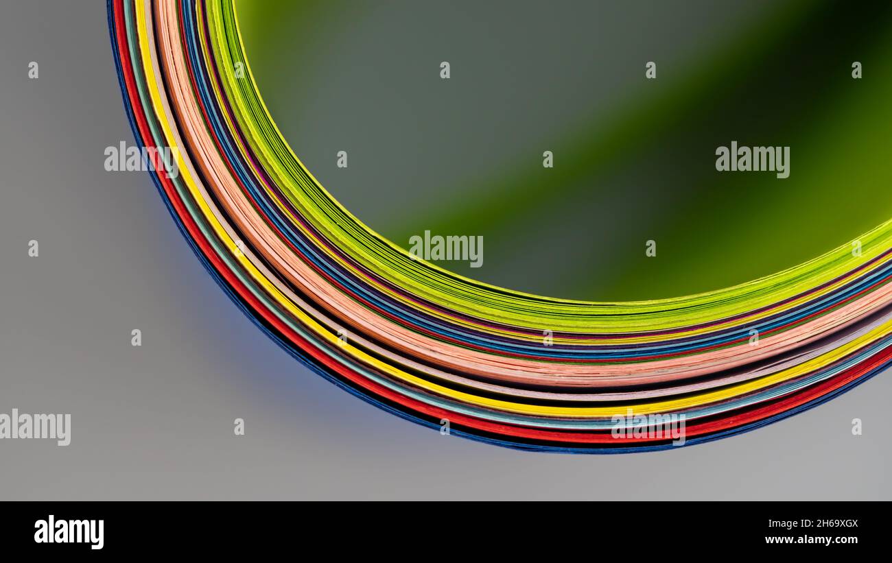 Colorful paper section in elliptical shapes on black background Stock ...