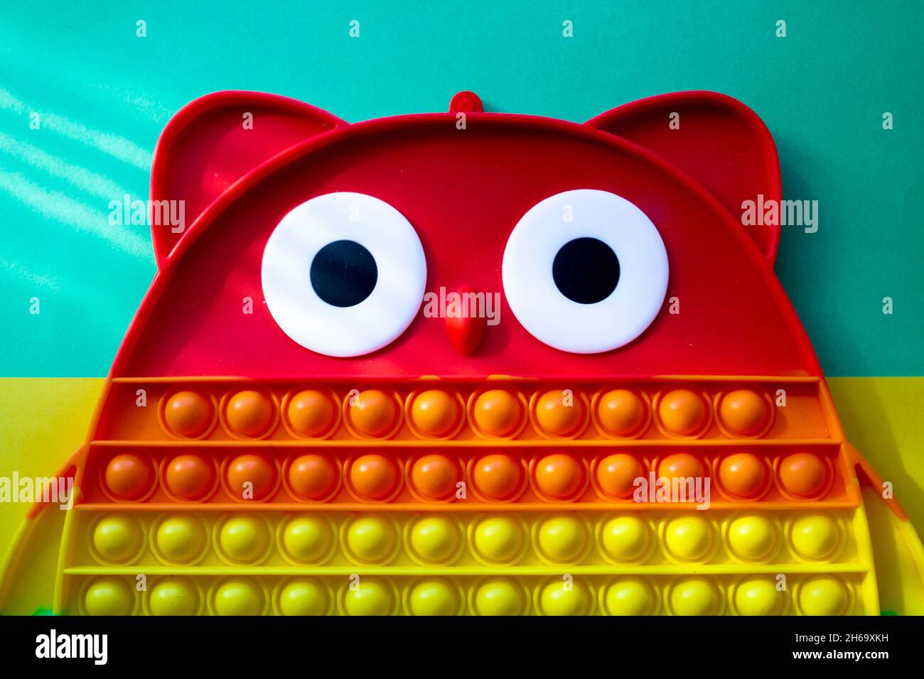 pop it on teal background Stock Photo - Alamy