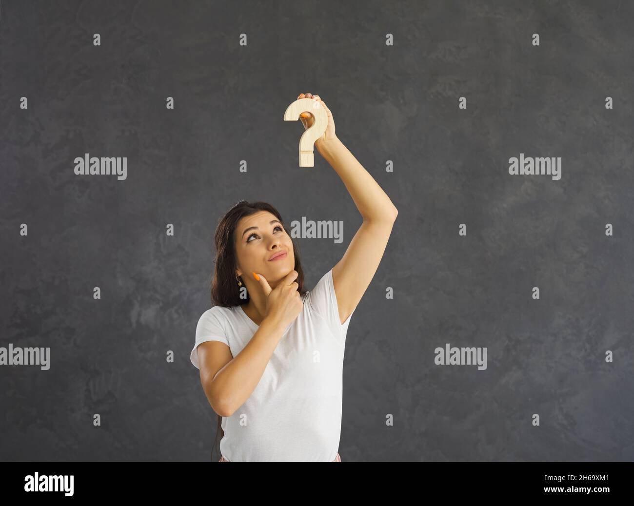 Woman thinking question mark hi-res stock photography and images - Alamy