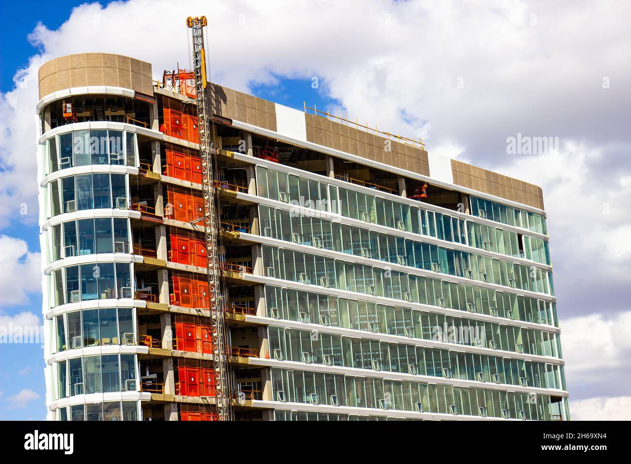 New Building Under Construction With Rounded Front Stock Photo - Alamy