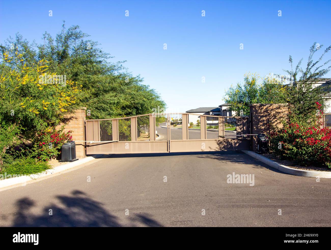Exit Metal Gate At Secure Subdivision In Late Afternoon Sun Stock Photo ...