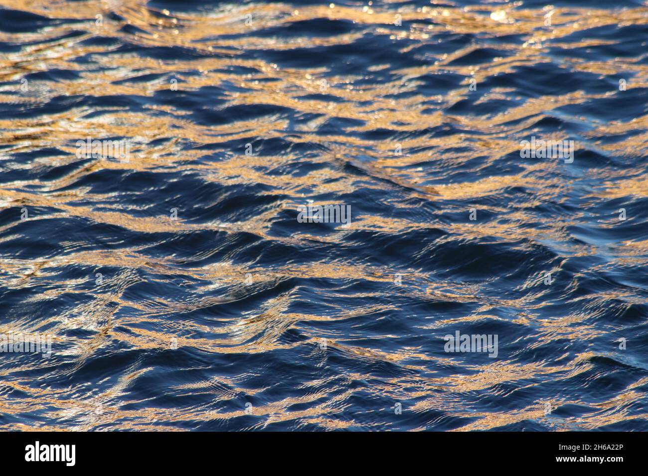 Patterns and colours in reflections of boats in harbour water Stock ...
