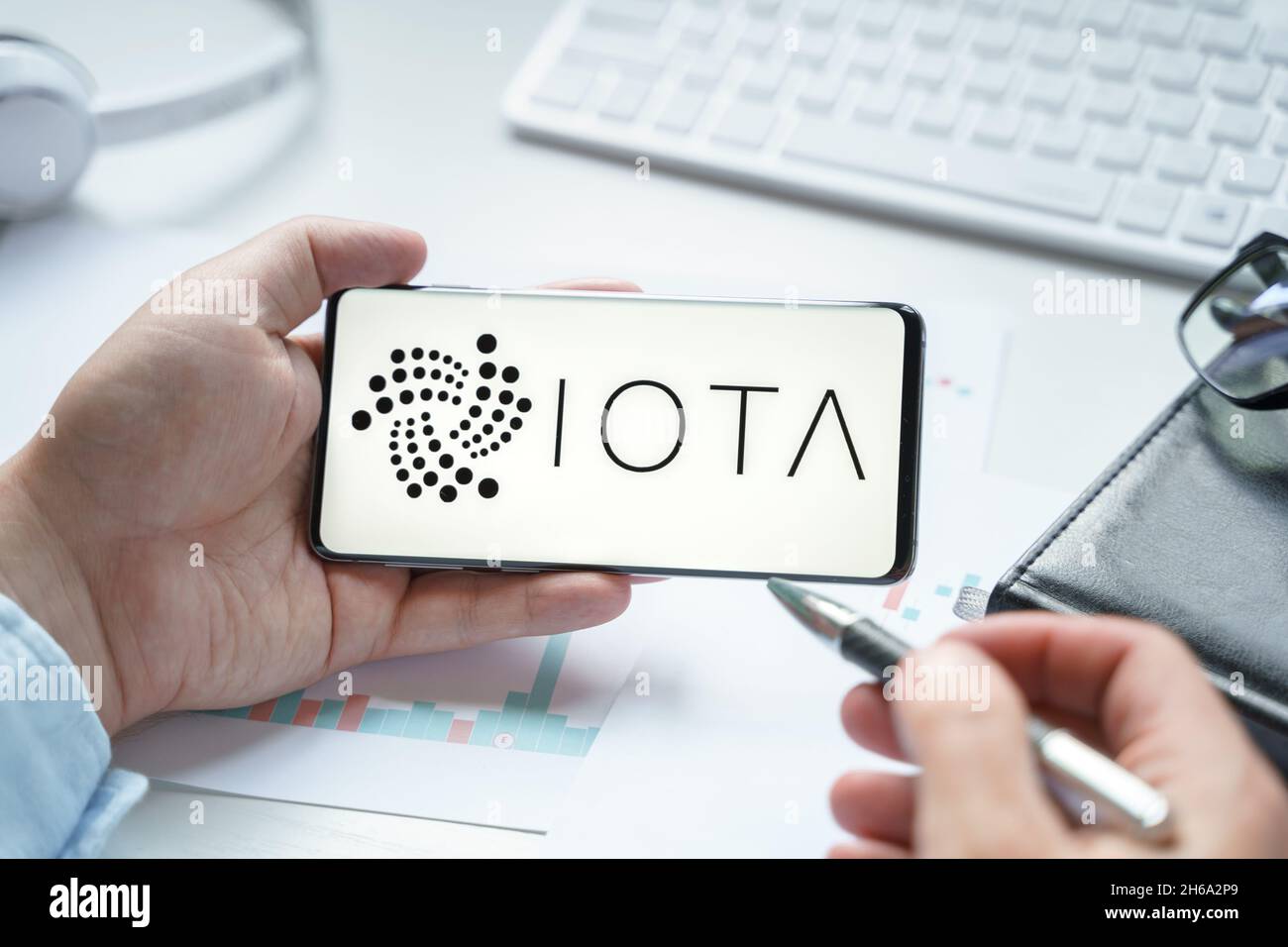 Russia, Moscow 08.06.2021.Logo of IOTA blockchain protocol in mobile phone.Distributed Ledger ...