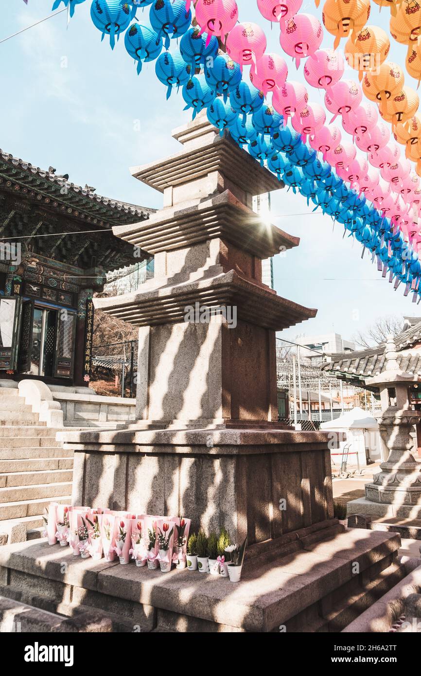 Ancient monument on Seoul Street. Multicolored Chinese lanterns ...