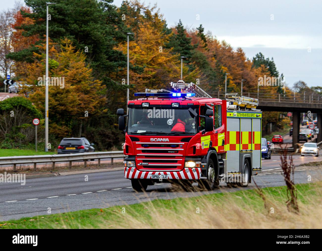 A Scottish Fire and Rescue Service fire engine responds to an emergency ...
