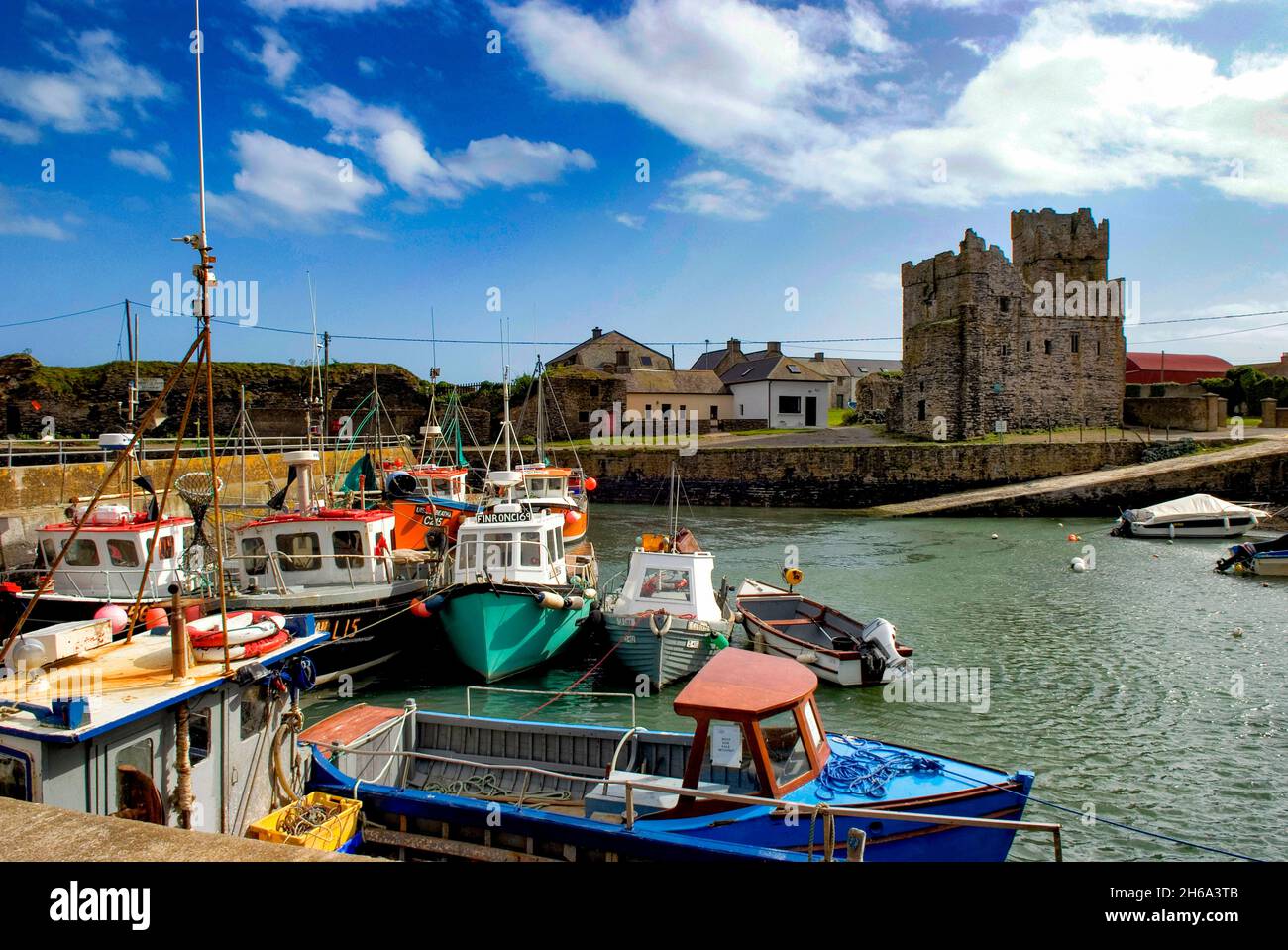 Slade Castle and Harbour, Slade Bay, County Wexford, Ireland Stock ...