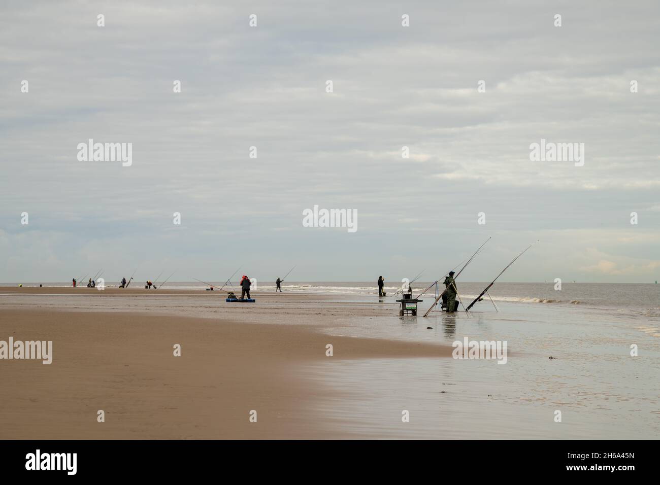 A Fishing off New Brighton beach the Wirral in UK Stock Photo - Alamy