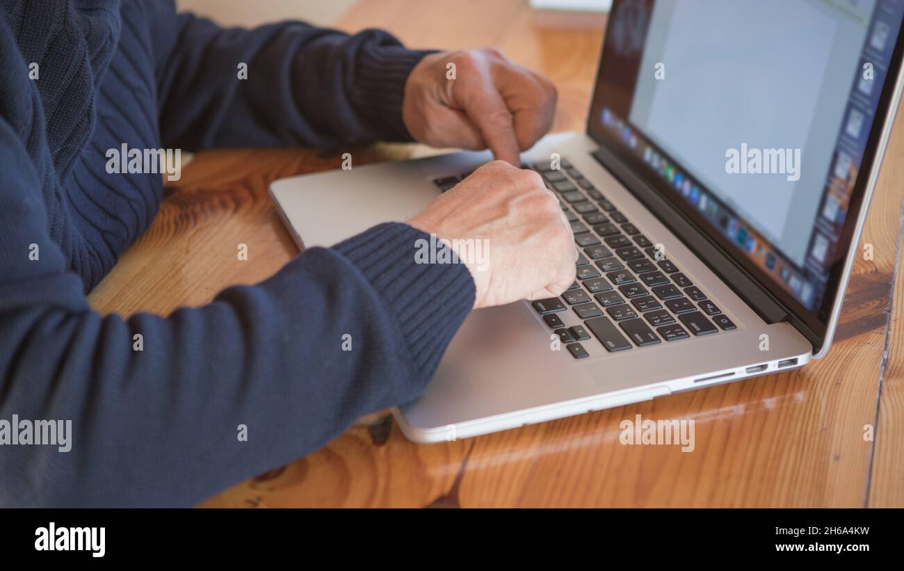 Old hands on the keyboard. Retired person learn to use computer Stock ...