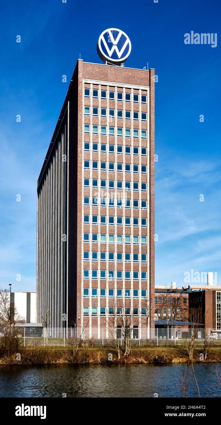 Administration building in Volkswagen car factory behind the canal with ...