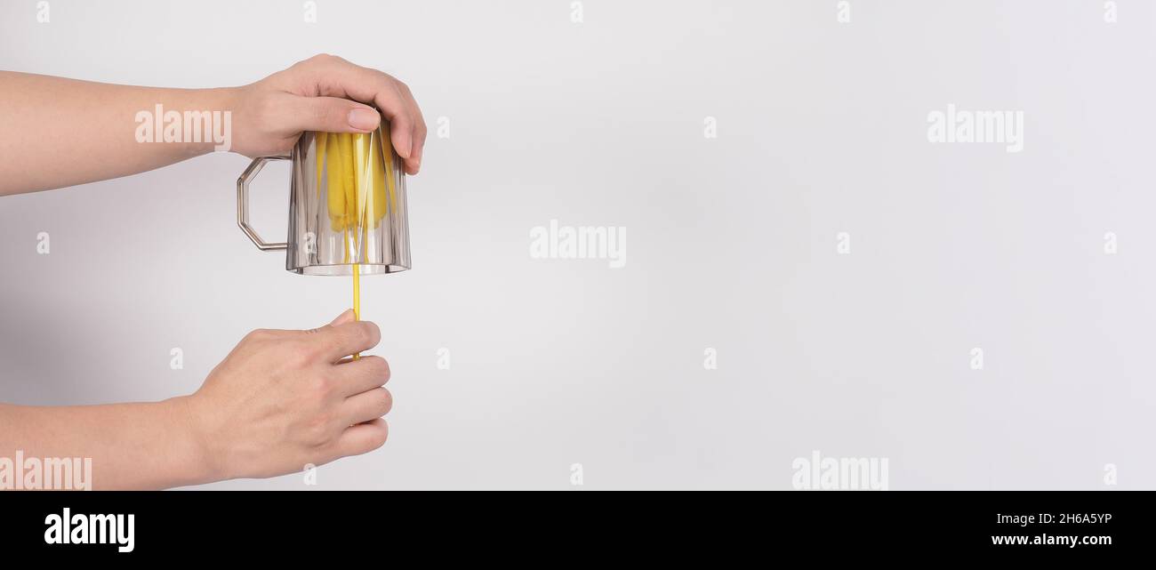 Clean and wash dish concept. Man hand washing drink glass on white ...