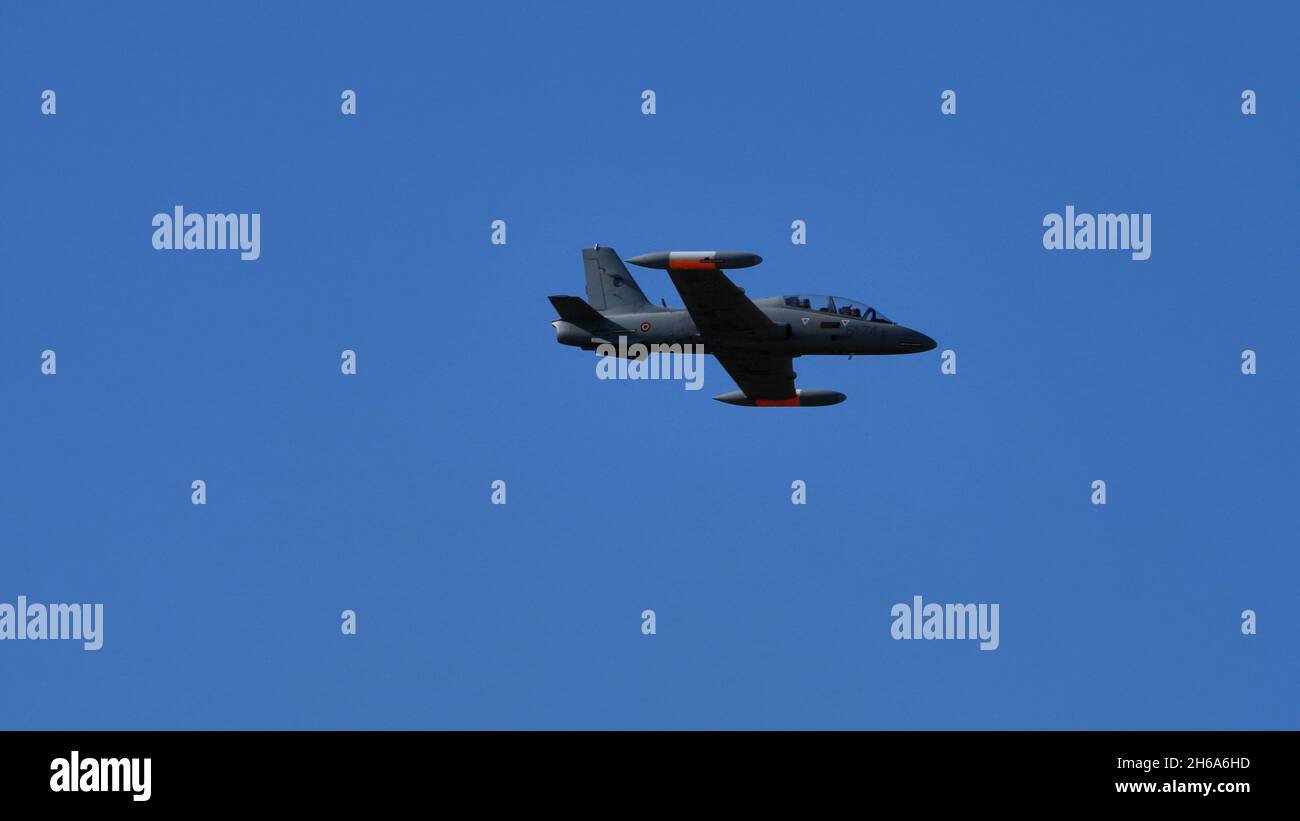 Udine, Italy SEPTEMBER, 18, 2021 Military jet plane in the blue sky ...