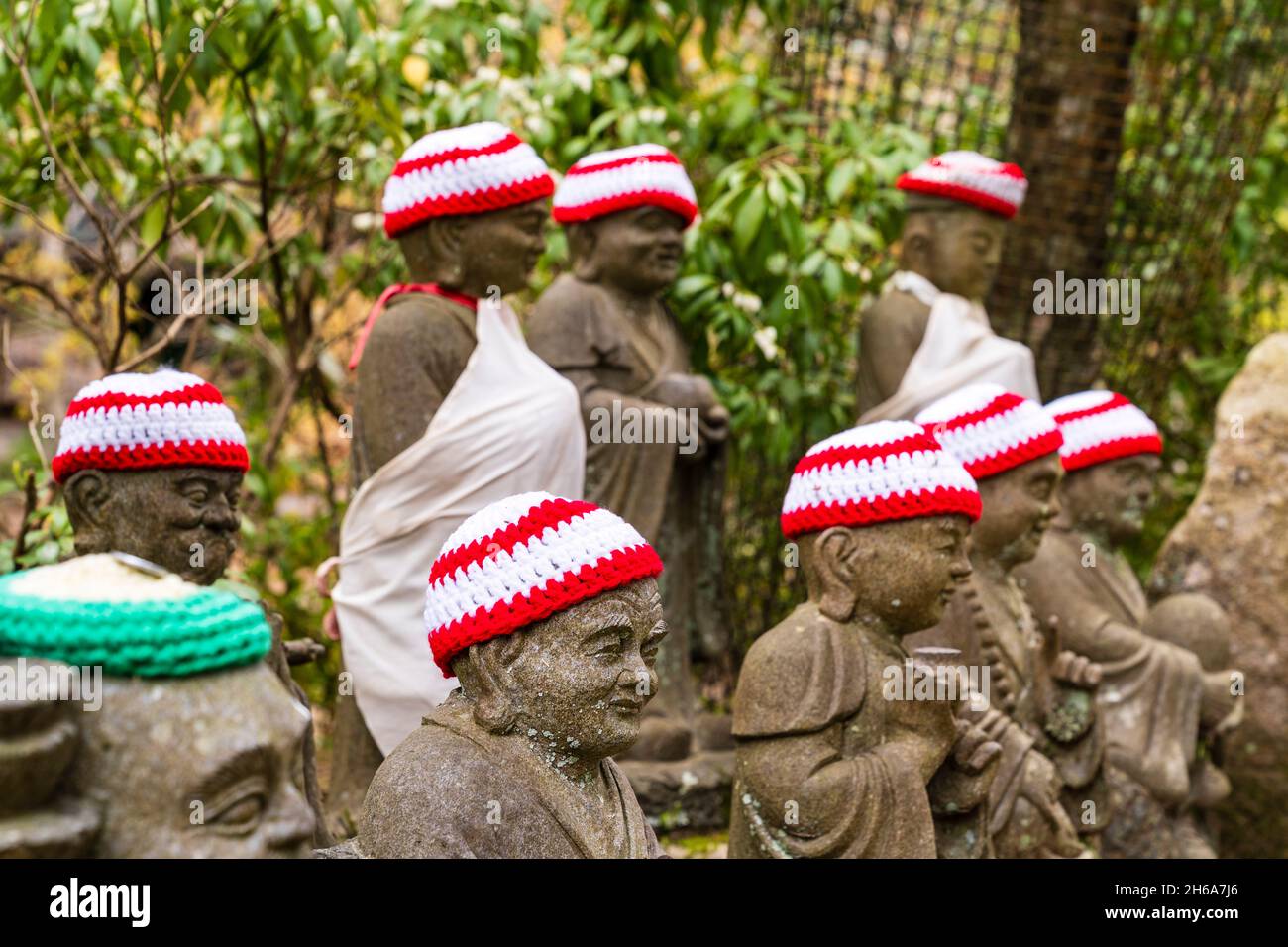 Japan, Miyajima. Small Rakan statues of Buddhist monks, disciples of ...