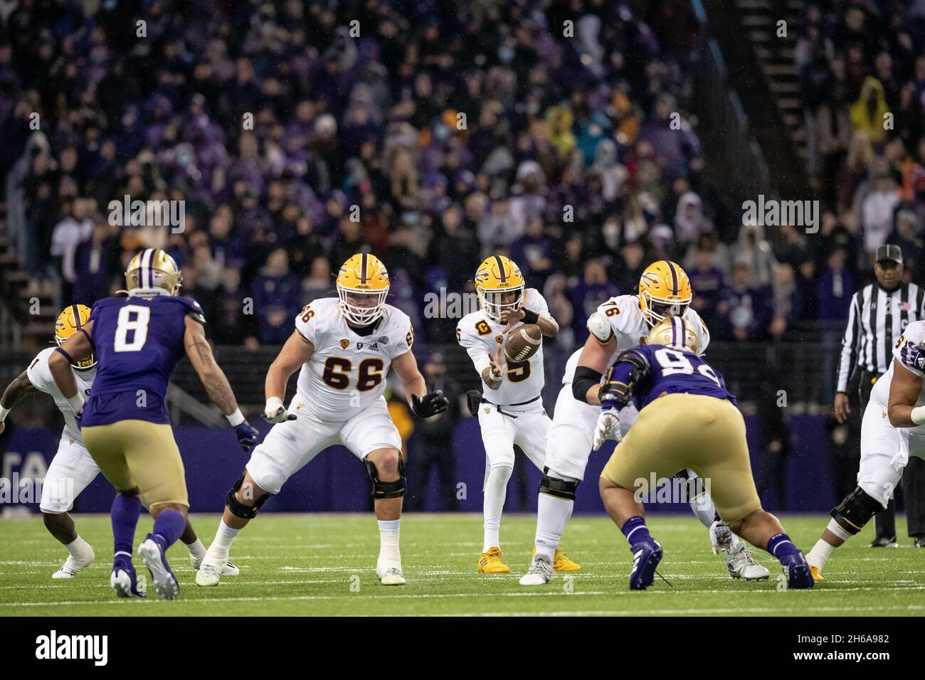 Arizona State Sun Devils quarterback Jayden Daniels (5) takes the step ...