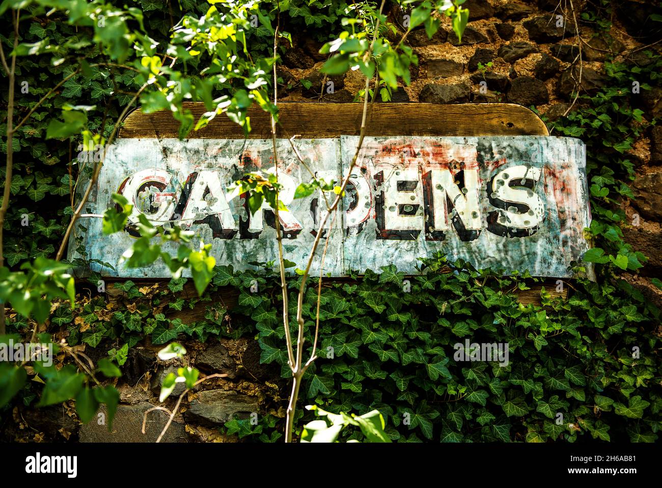 An Antique Garden sign Stock Photo - Alamy