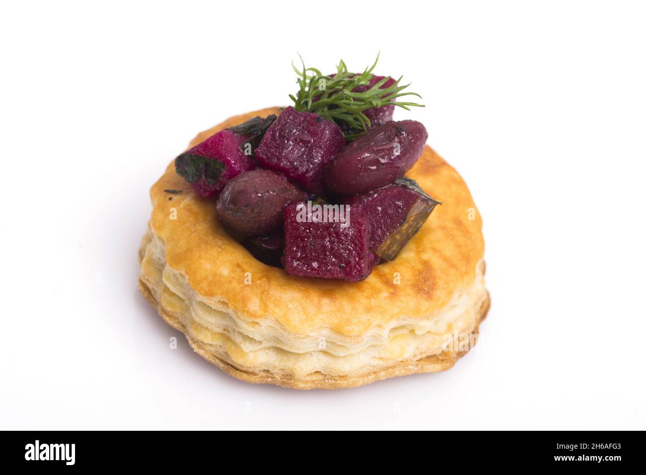 Delicious canapes with feta cheese, strawberries, black sesame, and ...