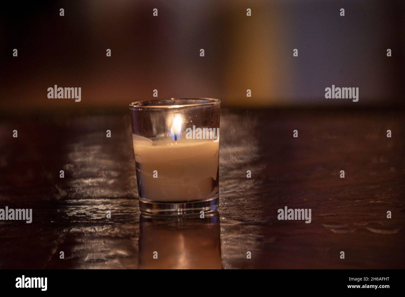 Candlelight reflections in rainbow colors Stock Photo - Alamy