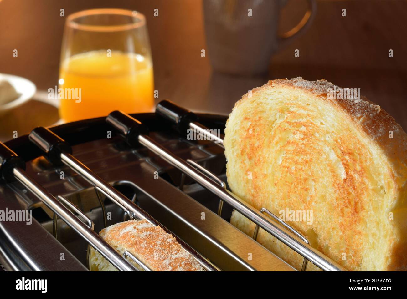 Toasted bread. A slice of toasted bread jumping out the toaster ...