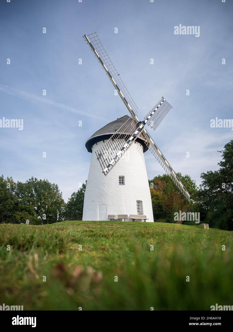 An old windmill on a hill Stock Photo - Alamy