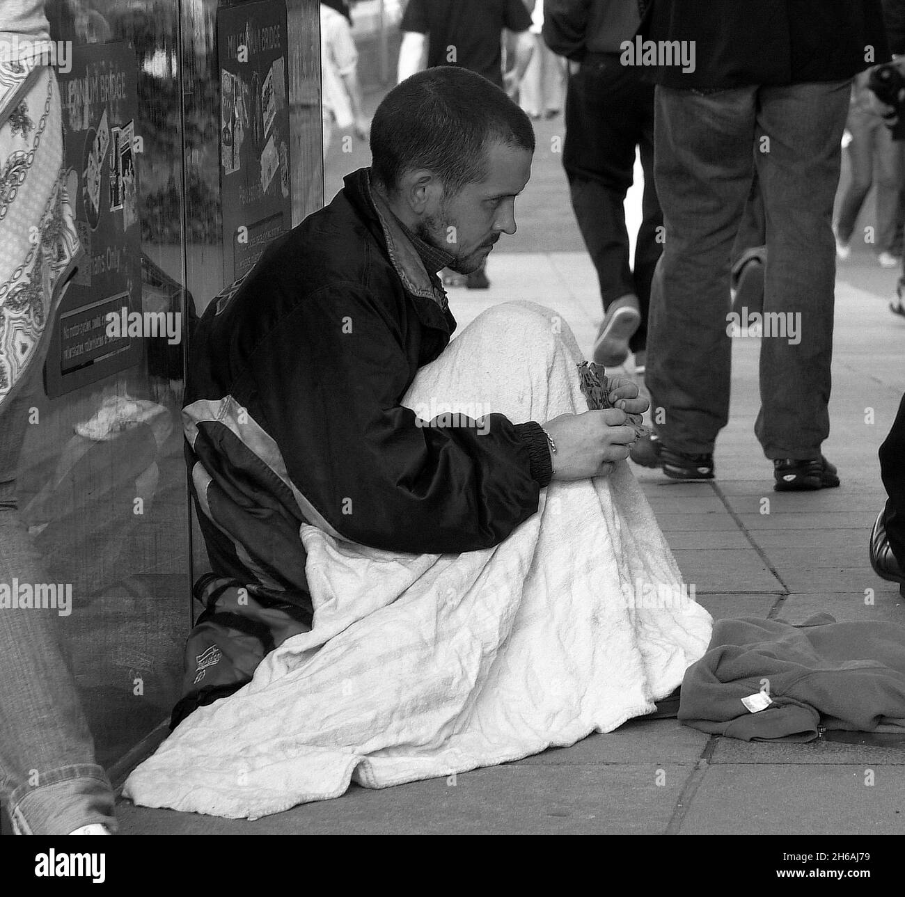 Man begging money Black and White Stock Photos & Images - Alamy