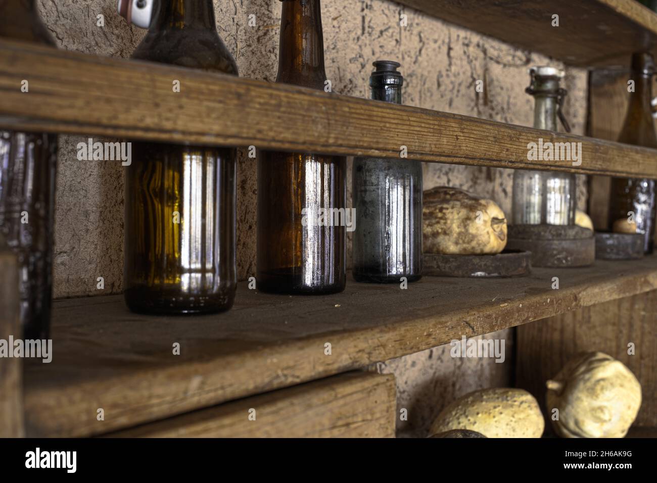 Perspective view of wooden rural old, grunge and aged shelf with old ...