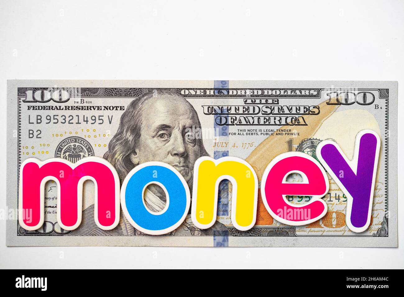 money colorful inscription on US 100 dollar banknote Stock Photo - Alamy