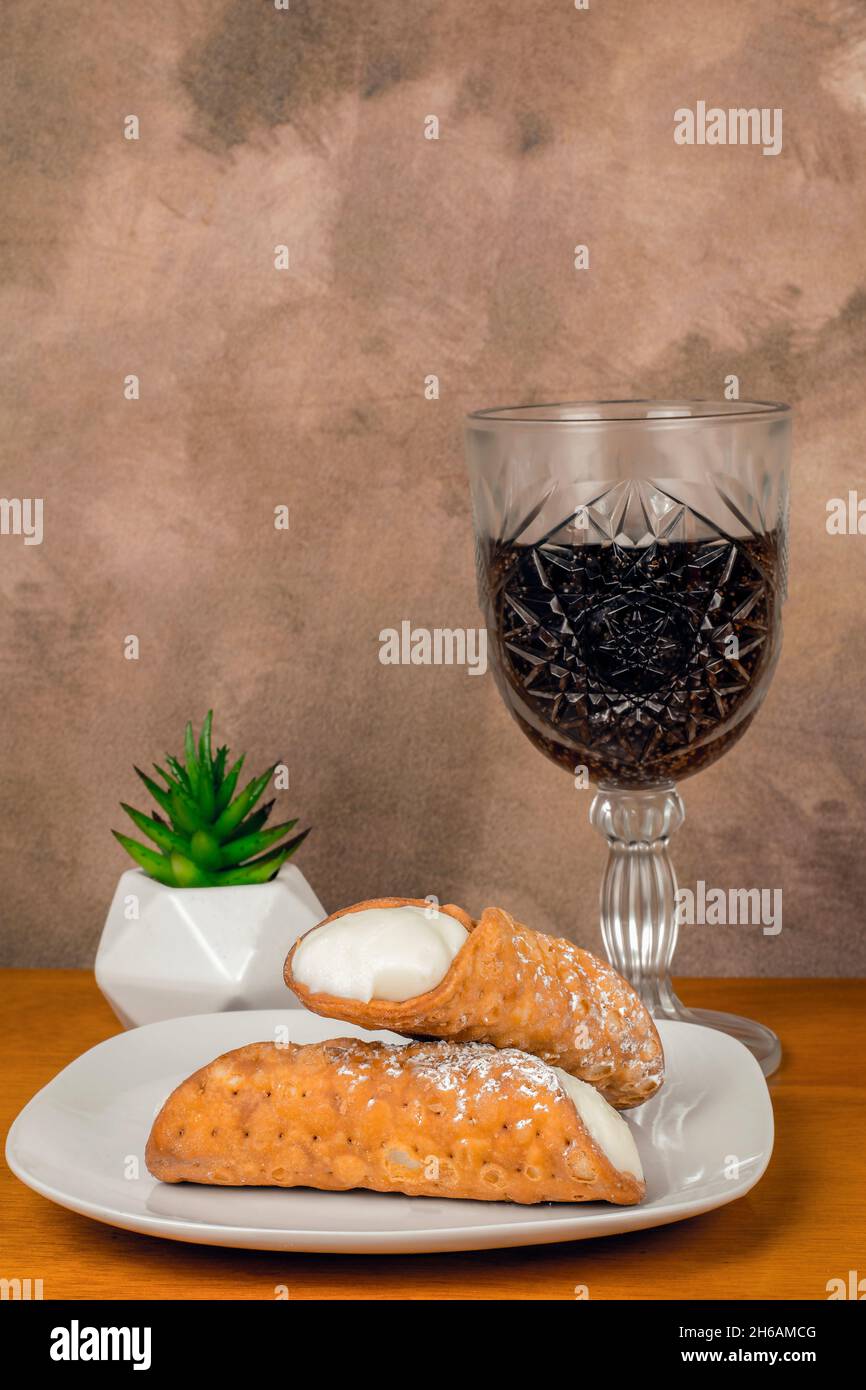 Two cannolis hi-res stock photography and images - Alamy