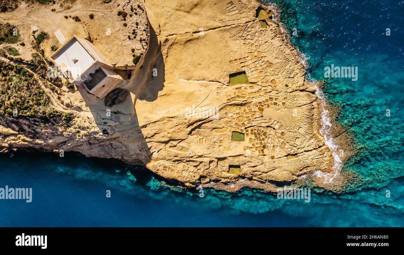 Aerial view of Xwejni Salt Pans,Xlendi Cliffs on Gozo island,Malta ...