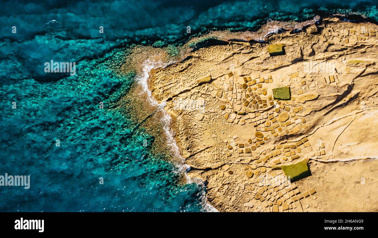 Aerial view of Xwejni Salt Pans,Xlendi Cliffs on Gozo island,Malta ...