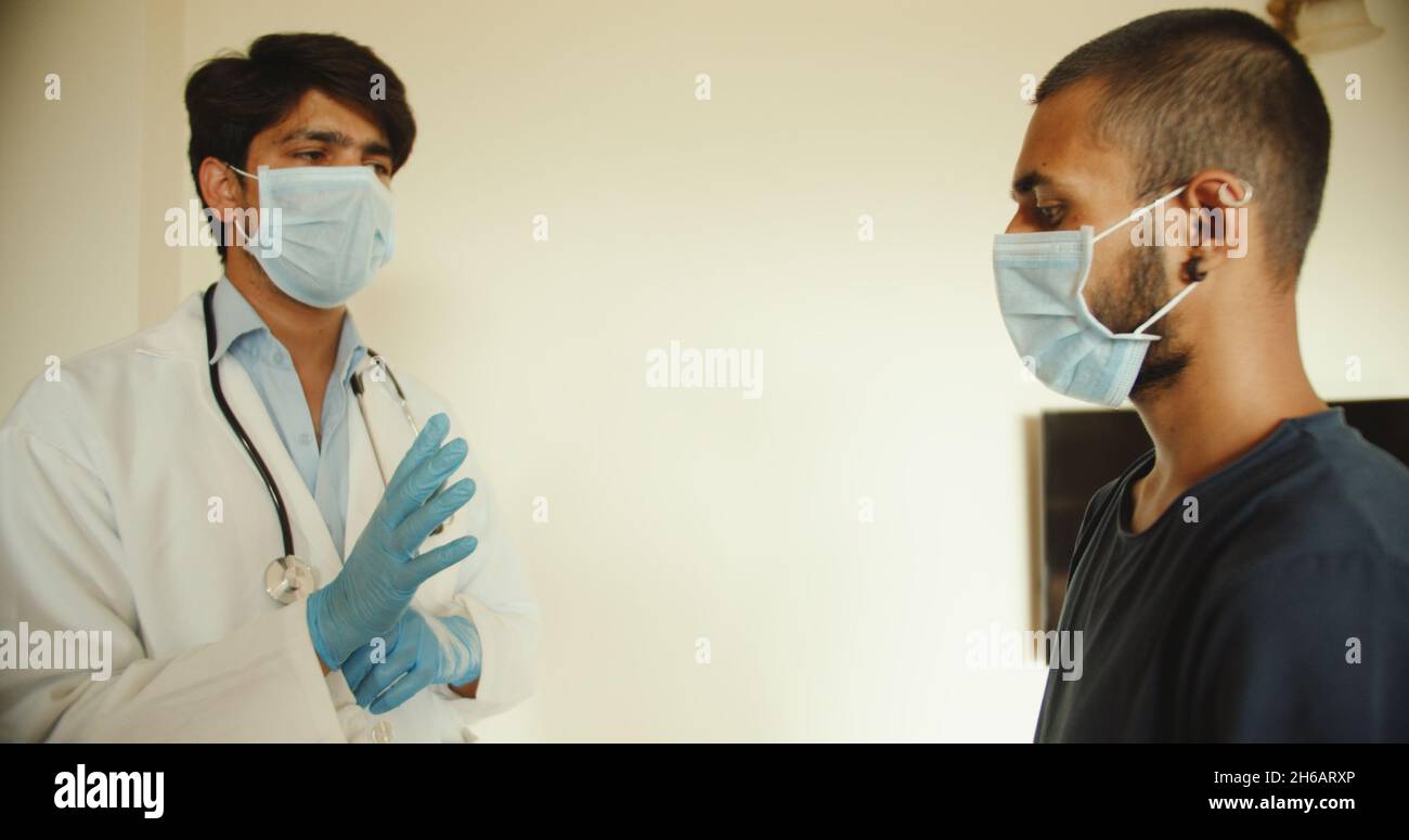 A doctor about to examine the patient in his room Stock Photo - Alamy