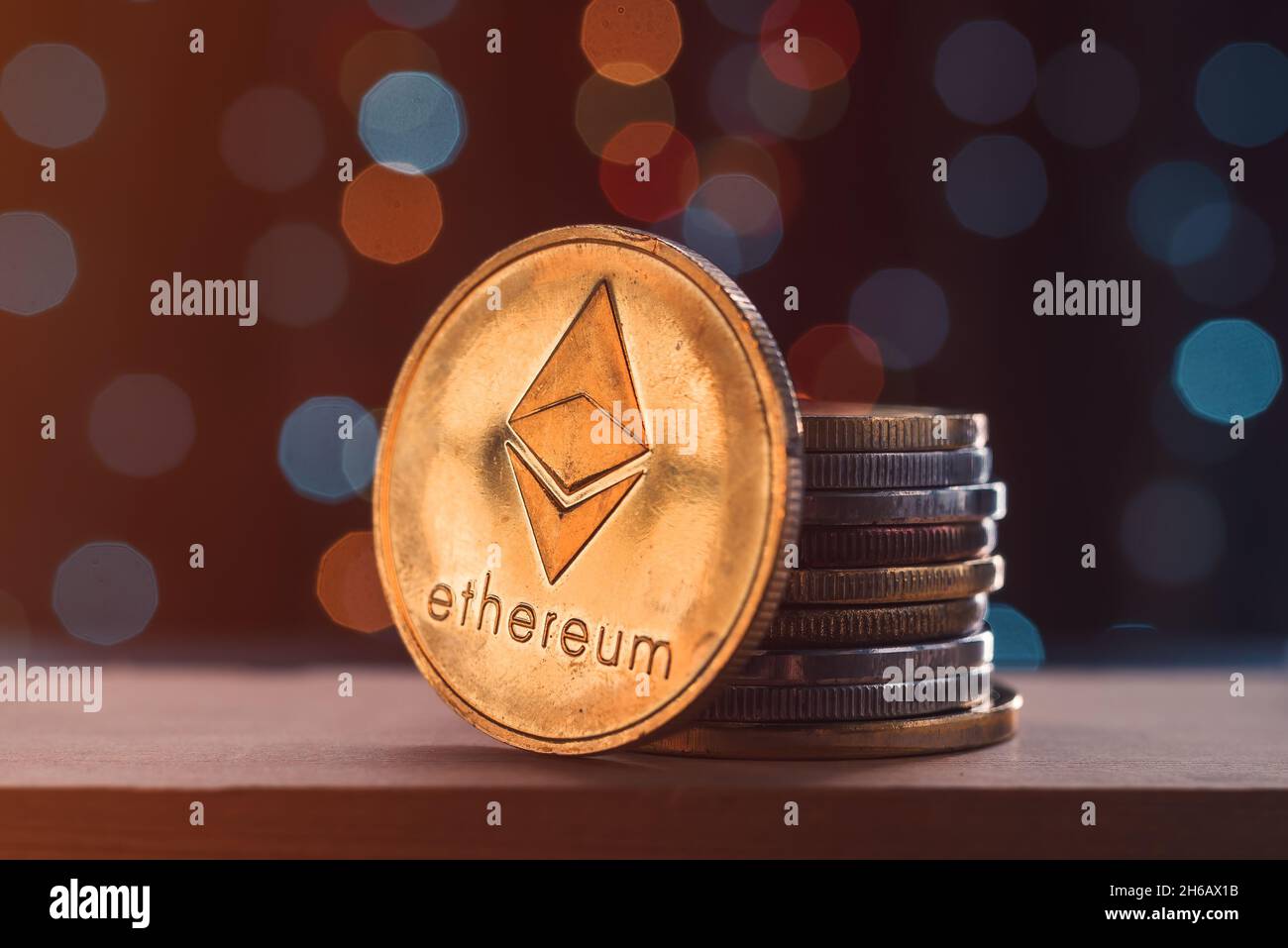 Ethereum coin with Christmas holiday season decoration, coin stack and ...
