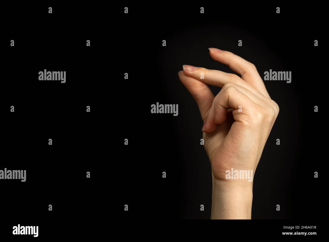 Hand gesture snapping fingers, easy sign and symbol on a black ...