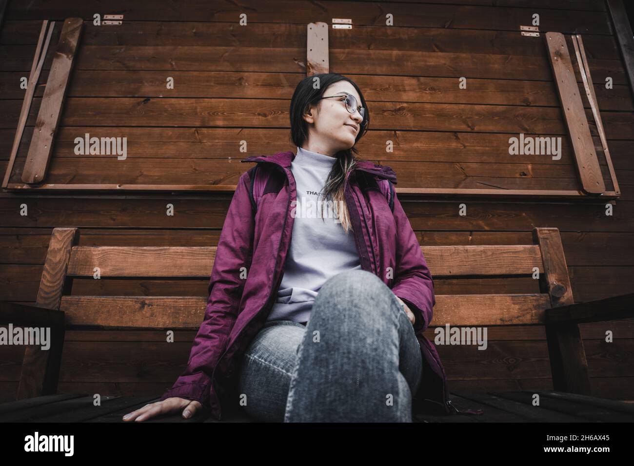Wooden house and human Stock Photo - Alamy