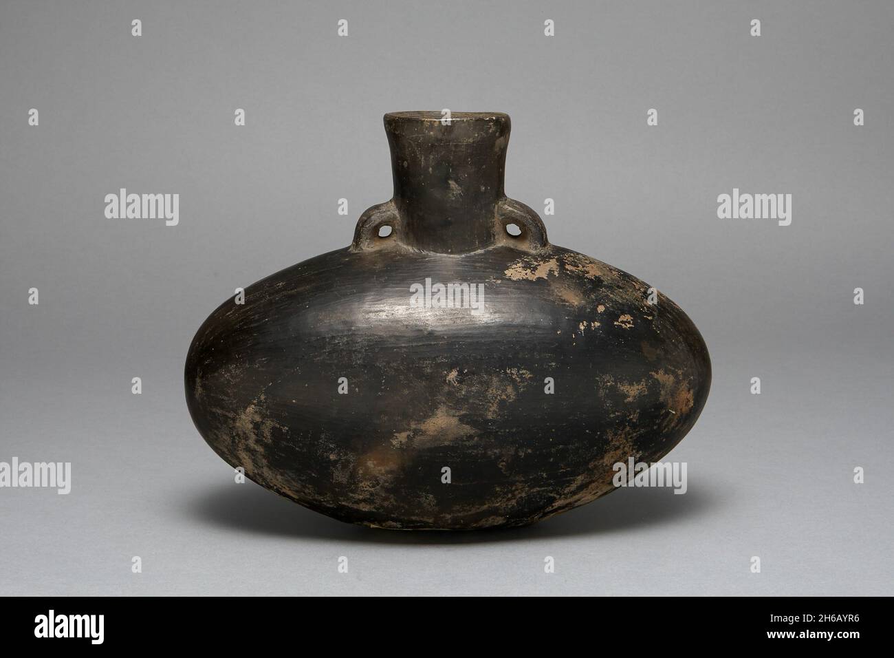 Blackware Jar with Single Spout, A.D. 1200/1450. A squat oval-shaped ...