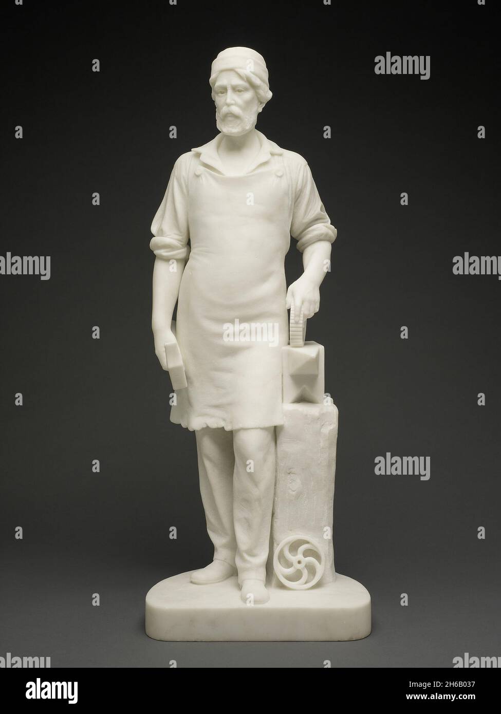 Machinist, c. 1859. White marble statue of machinist with hammer, anvil ...