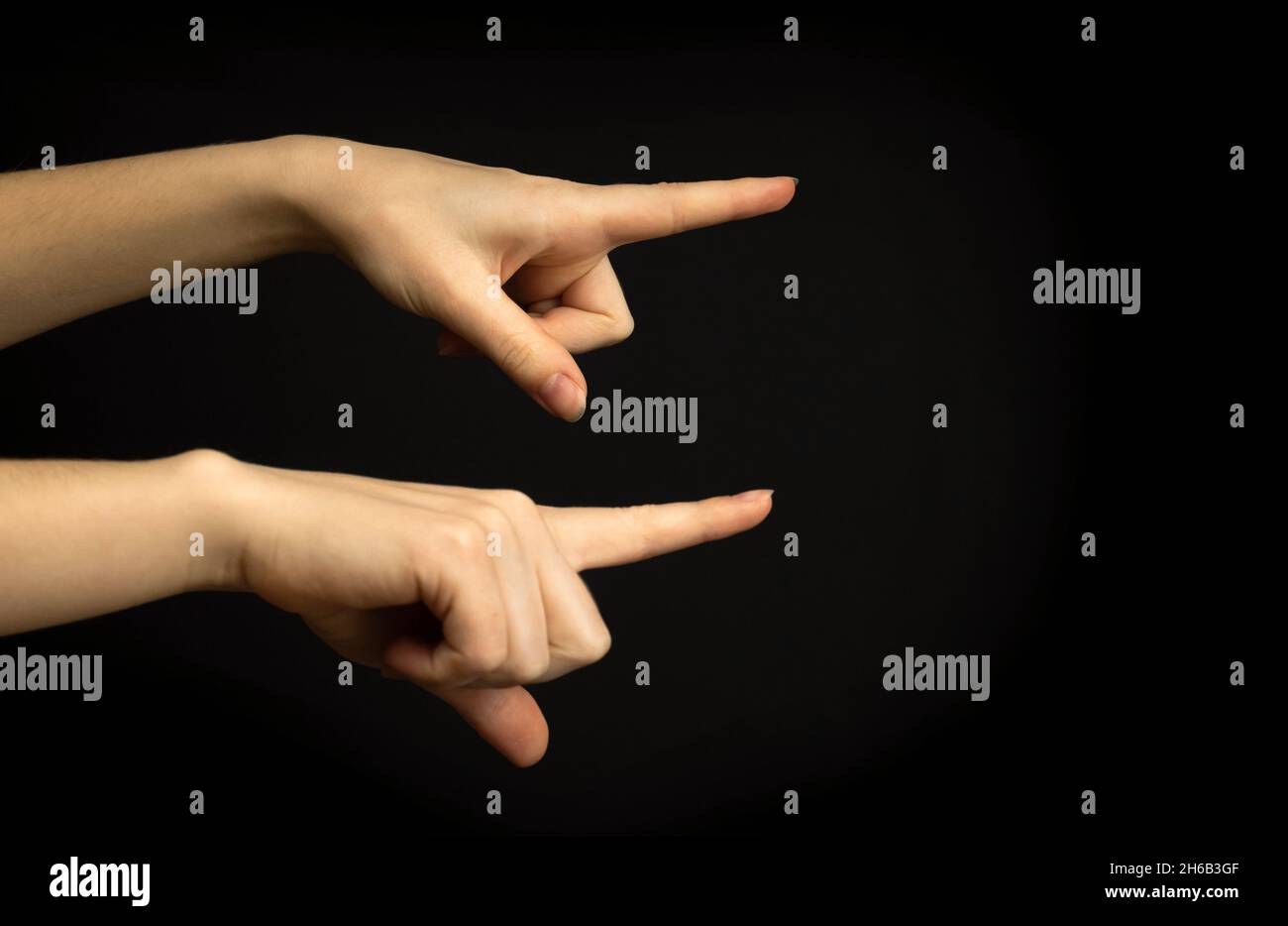 Hands point to something. Woman hand gesture, pointing sign, gesture ...