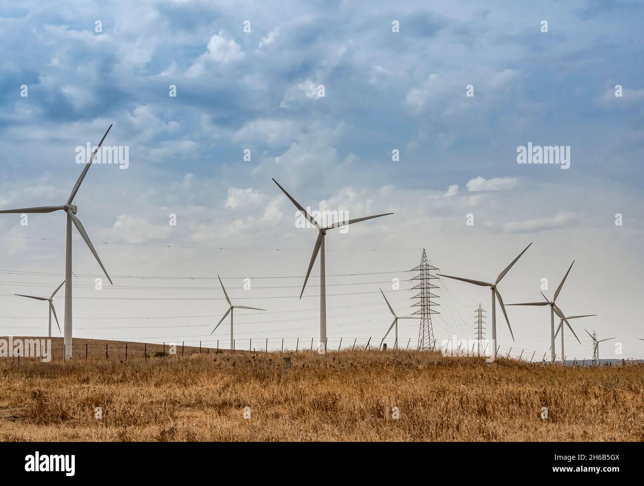 Electrical energy in nature. Clean energy concept. Wind energy and high ...