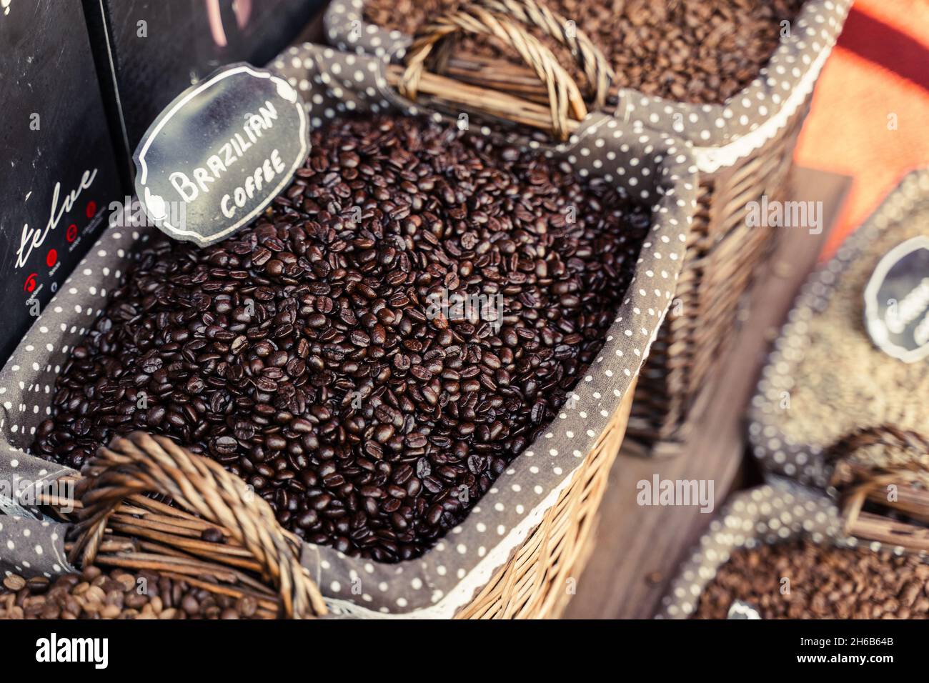 Brazilian coffee beans in wooden basket. Aromatic roasted coffee ...