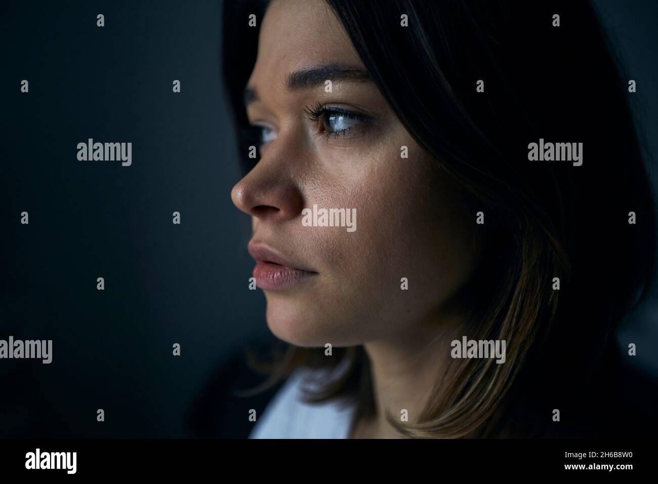 Sad woman with depression sitting alone in home and struggle with ...