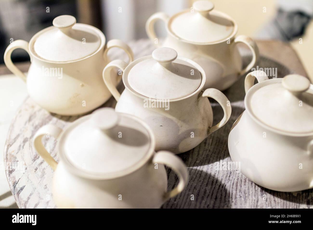 unglazed biscuit pottery vessel with two handlesat Gladstone Pottery ...