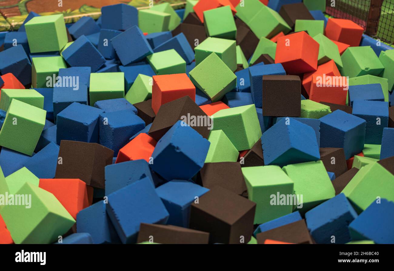 Happy children playing cubes hi-res stock photography and images - Alamy
