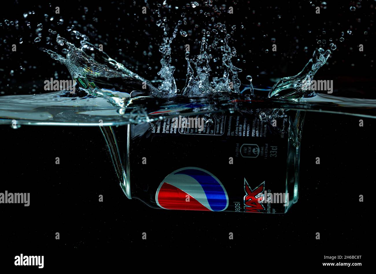 Beautiful view of can of Pepsi cola falling into water isolation on ...