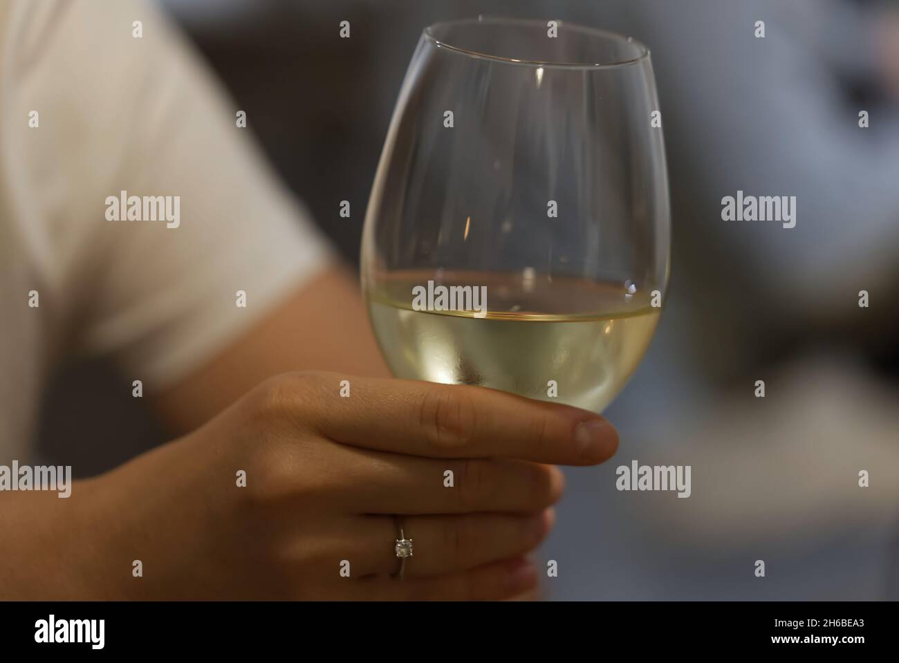 Hand on wine glass woman hi-res stock photography and images - Alamy