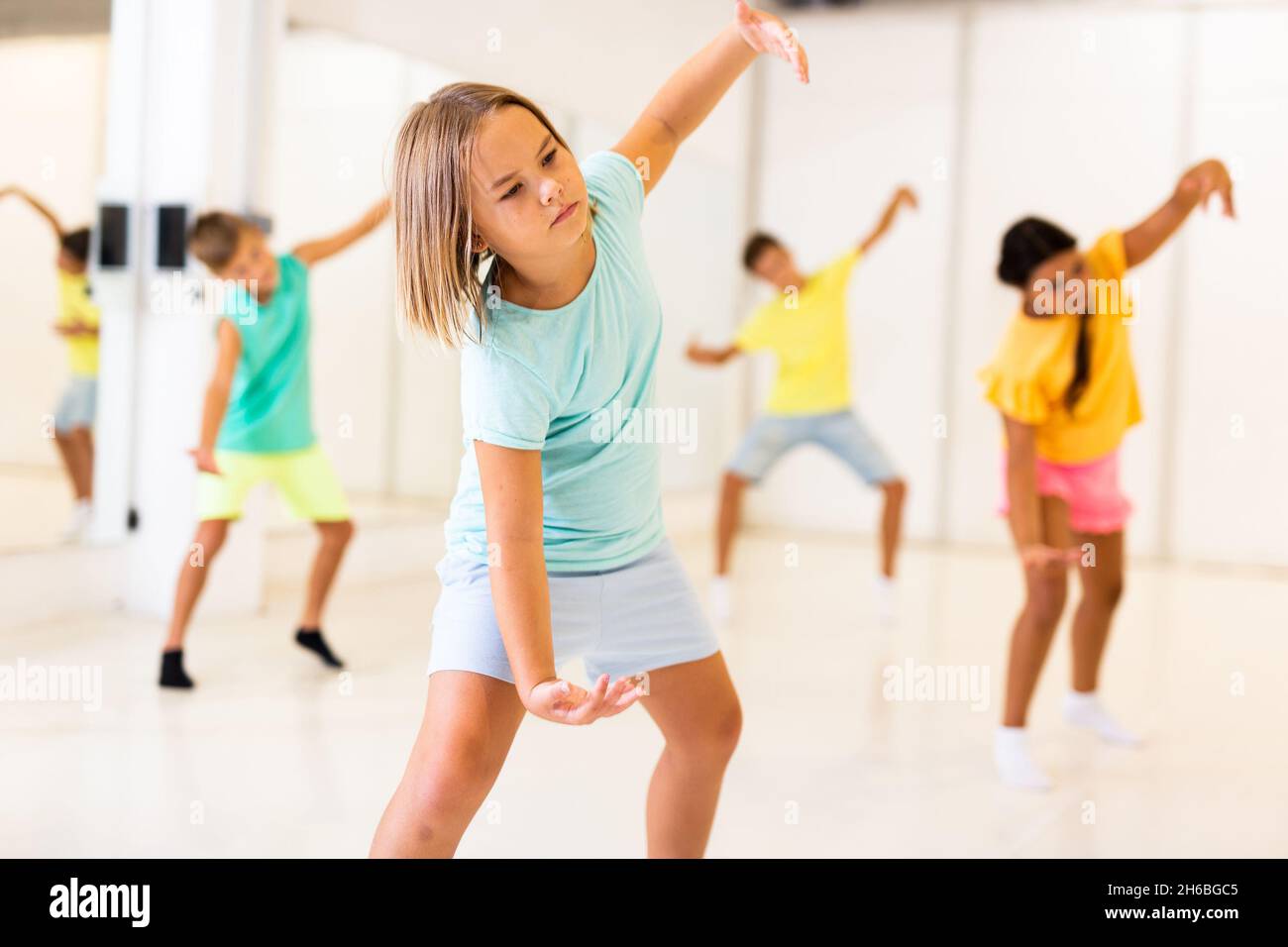 Tween girl krump dancer in choreographic studio with children Stock ...