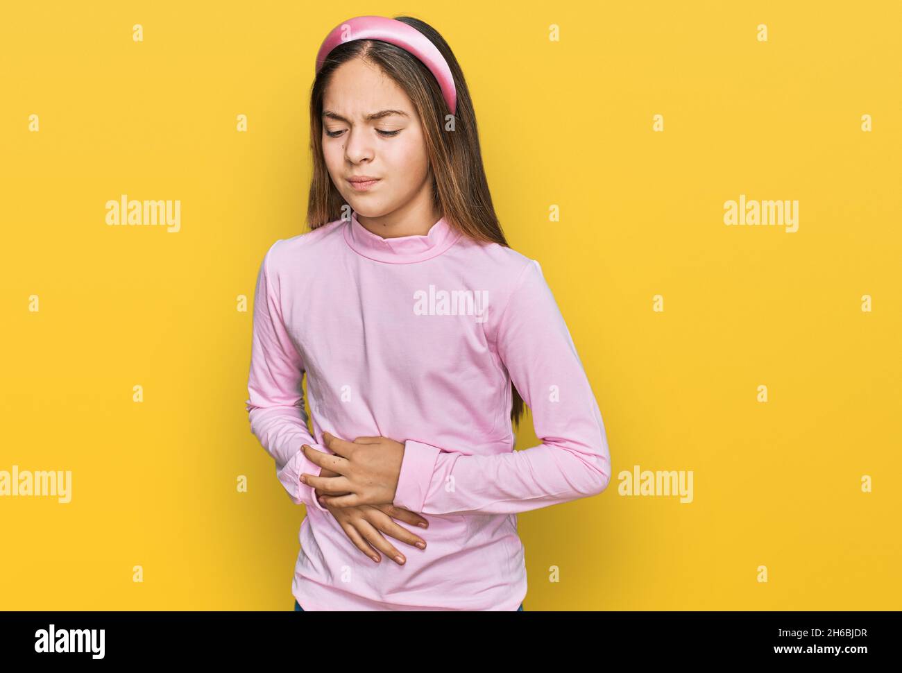 Child and abdominal pain and studio hi-res stock photography and images ...